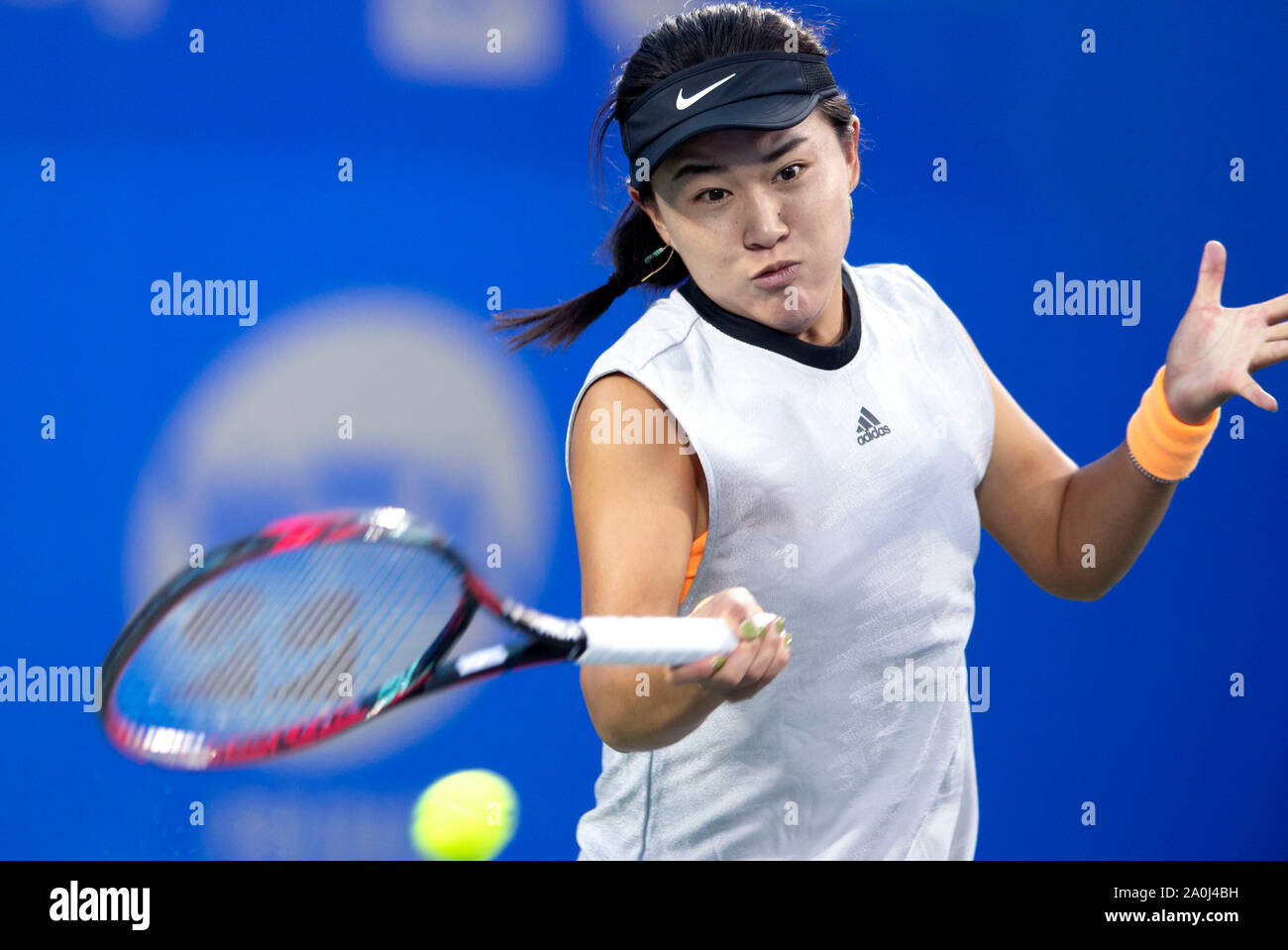 Wuhan, China. 20th Sep, 2019. Zhu Lin of China returns a shot during ...