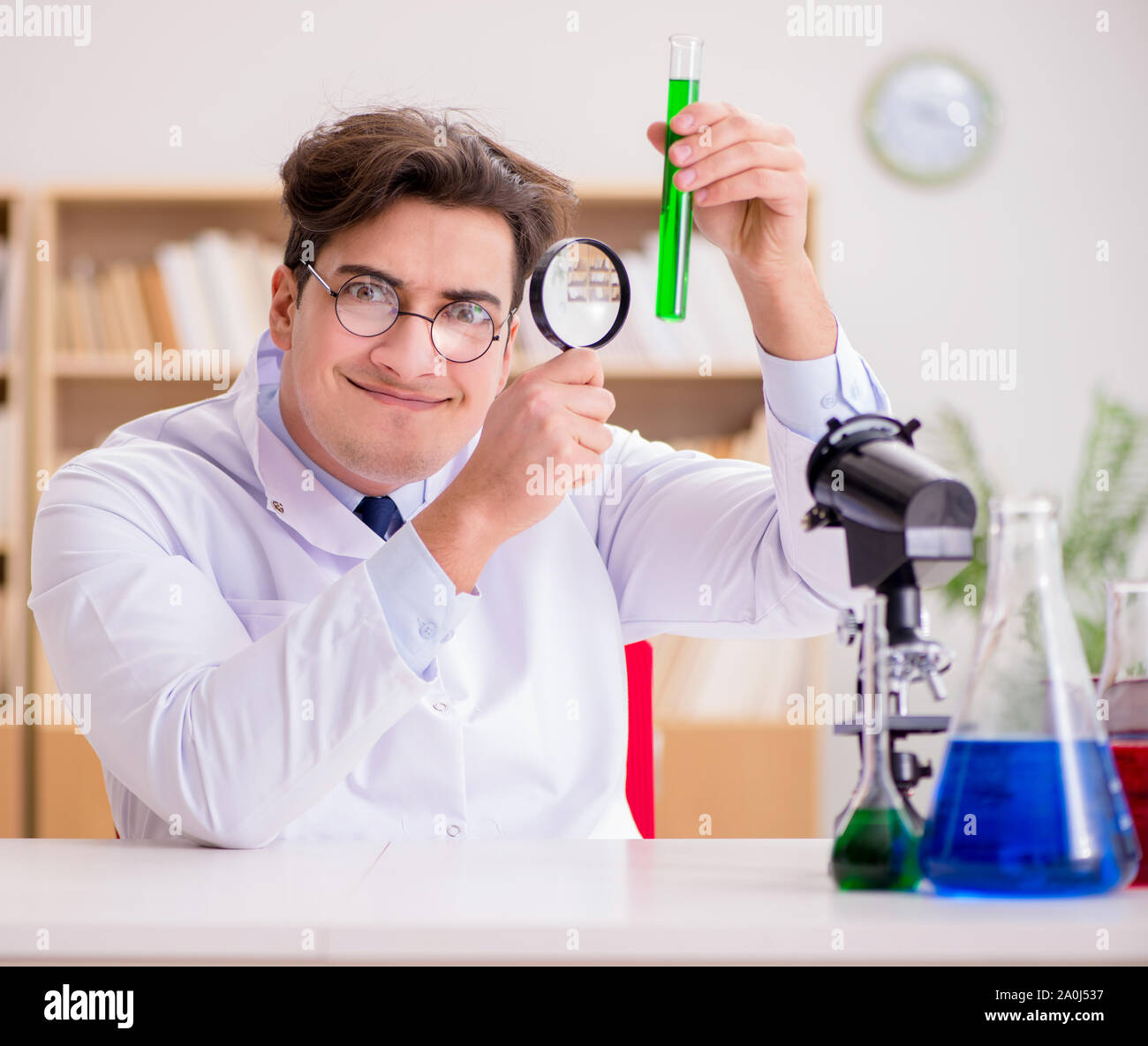 The mad crazy scientist doctor doing experiments in a laboratory Stock ...