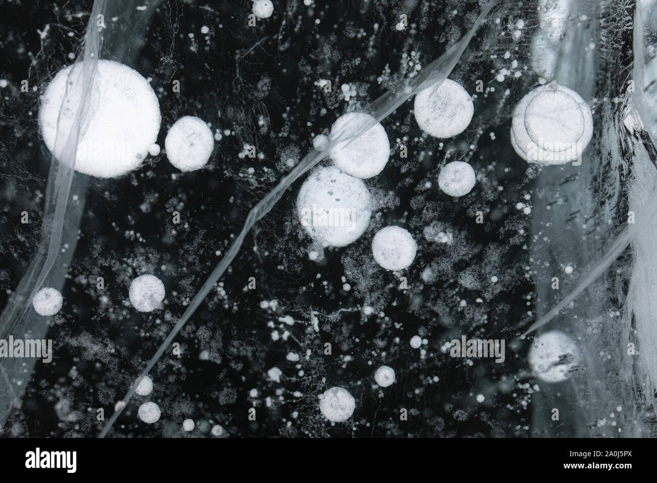 Frozen methane bubbles inside the ice of Lake Baikal Stock Photo - Alamy