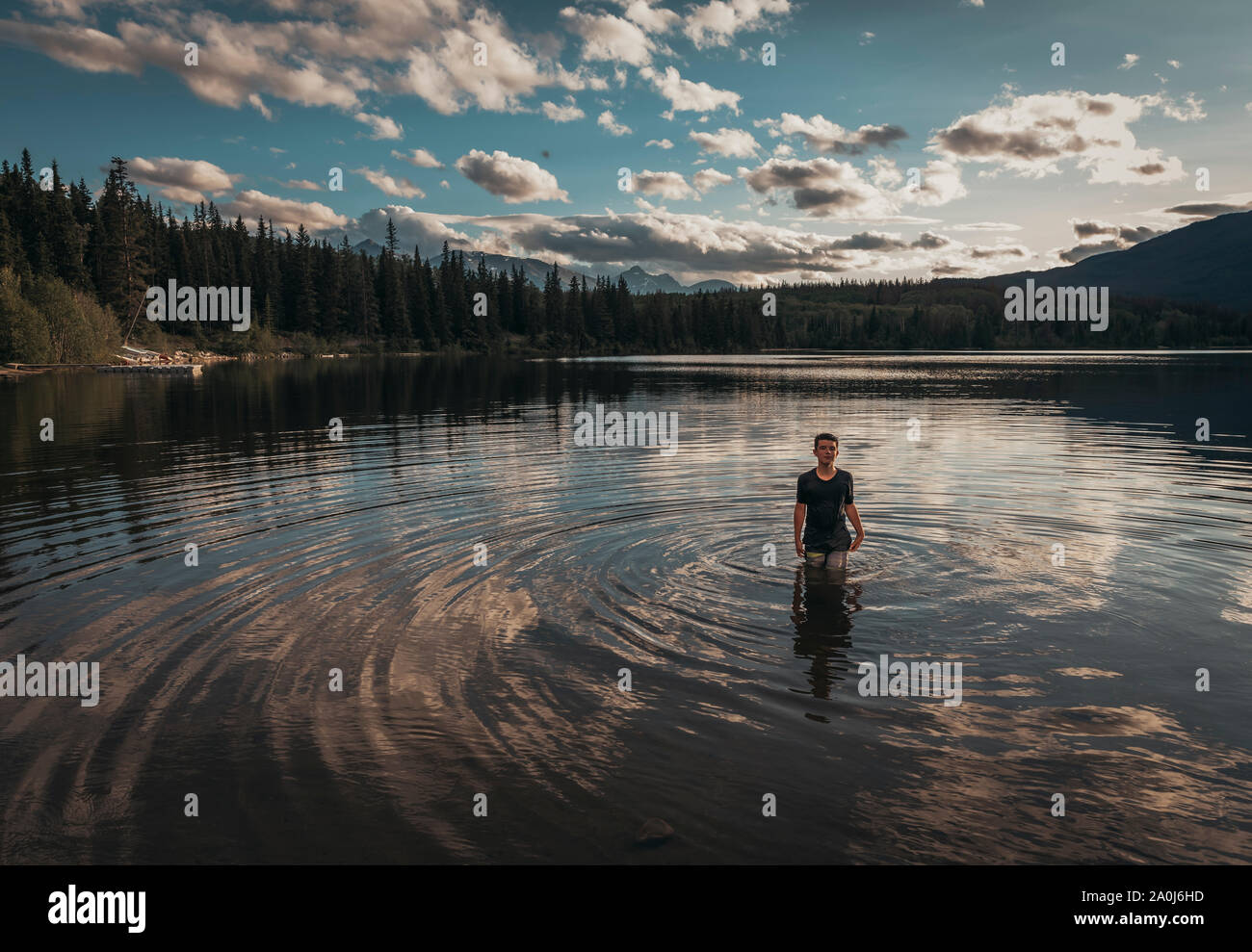 Boy reflection water looking hi-res stock photography and images - Alamy