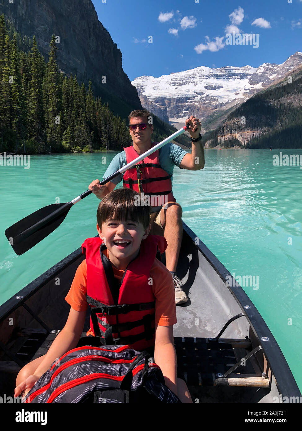 Father son paddling hi-res stock photography and images - Alamy