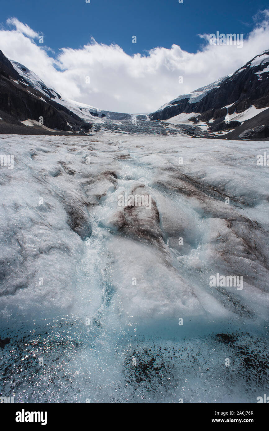 Glacial stream running off Athabasca Glacier in the Columbia Icefield ...