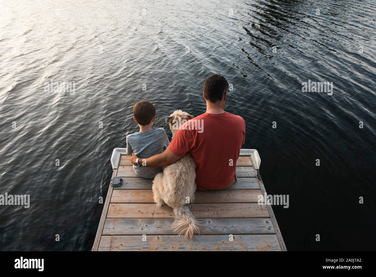 Man Sitting On Dock High Resolution Stock Photography and Images - Alamy