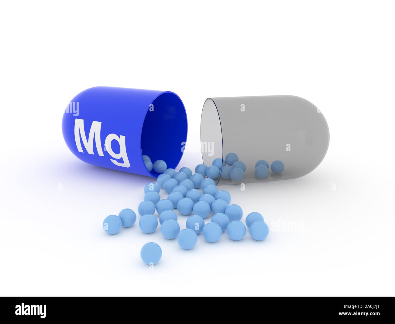 Open capsule with Mg Magnesium on a white table, food supplement ...