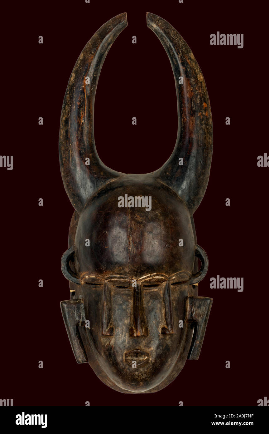 Interesting African Mask with four eyes and three noses and two horns ...