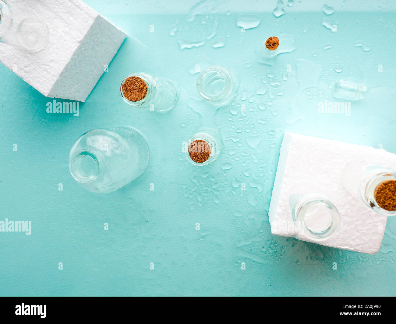 Few transparent bottles, water sprays. empty glass bottles Stock Photo ...