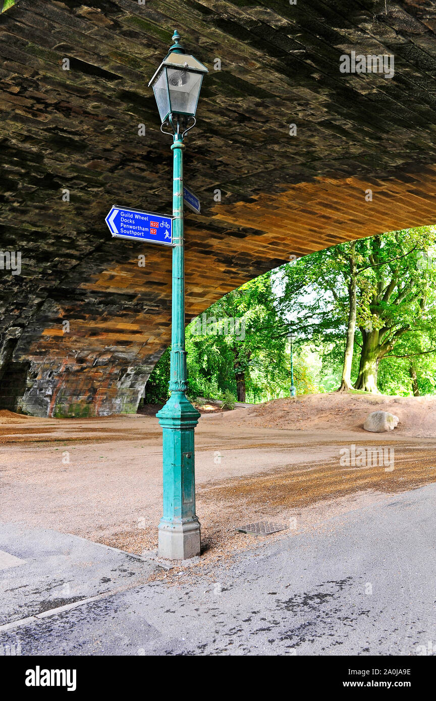 Old Victorian lamp post underneath stone bridge arch Stock Photo - Alamy