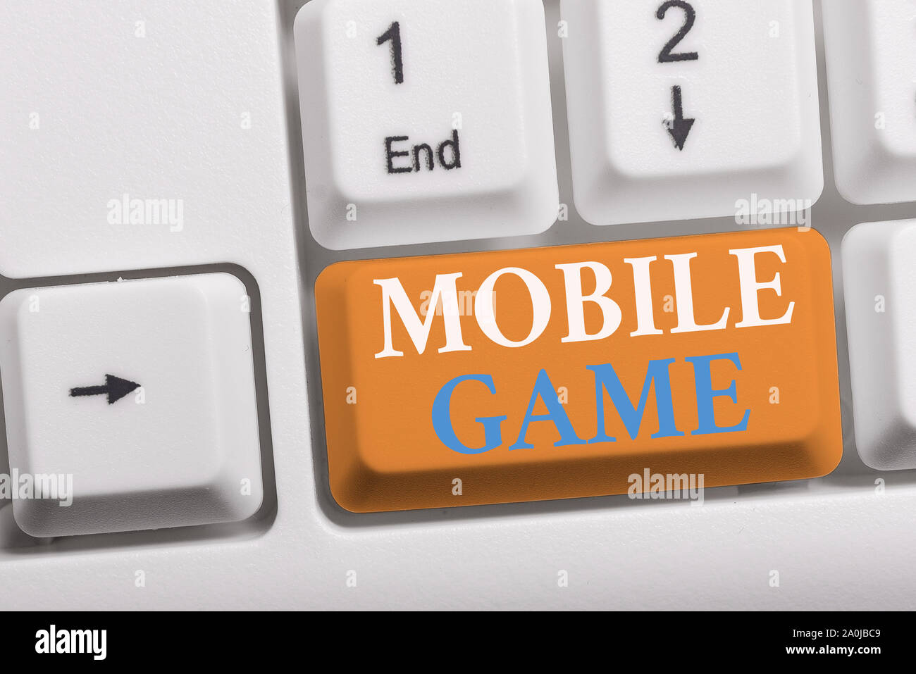 Writing note showing Mobile Game. Business concept for they are ...