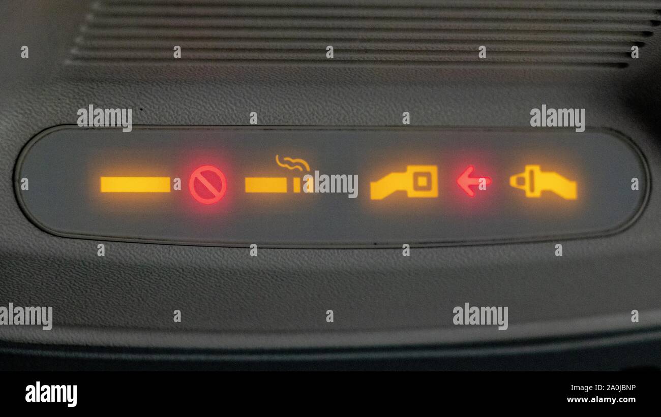 Overhead compartment hi-res stock photography and images - Alamy