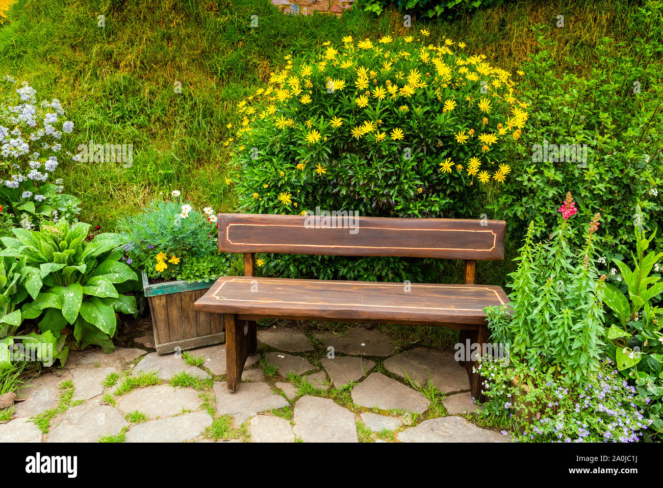 MATAMATA, NEW ZEALAND - OCTOBER 10, 2018: Wooden bench in Hobbiton ...