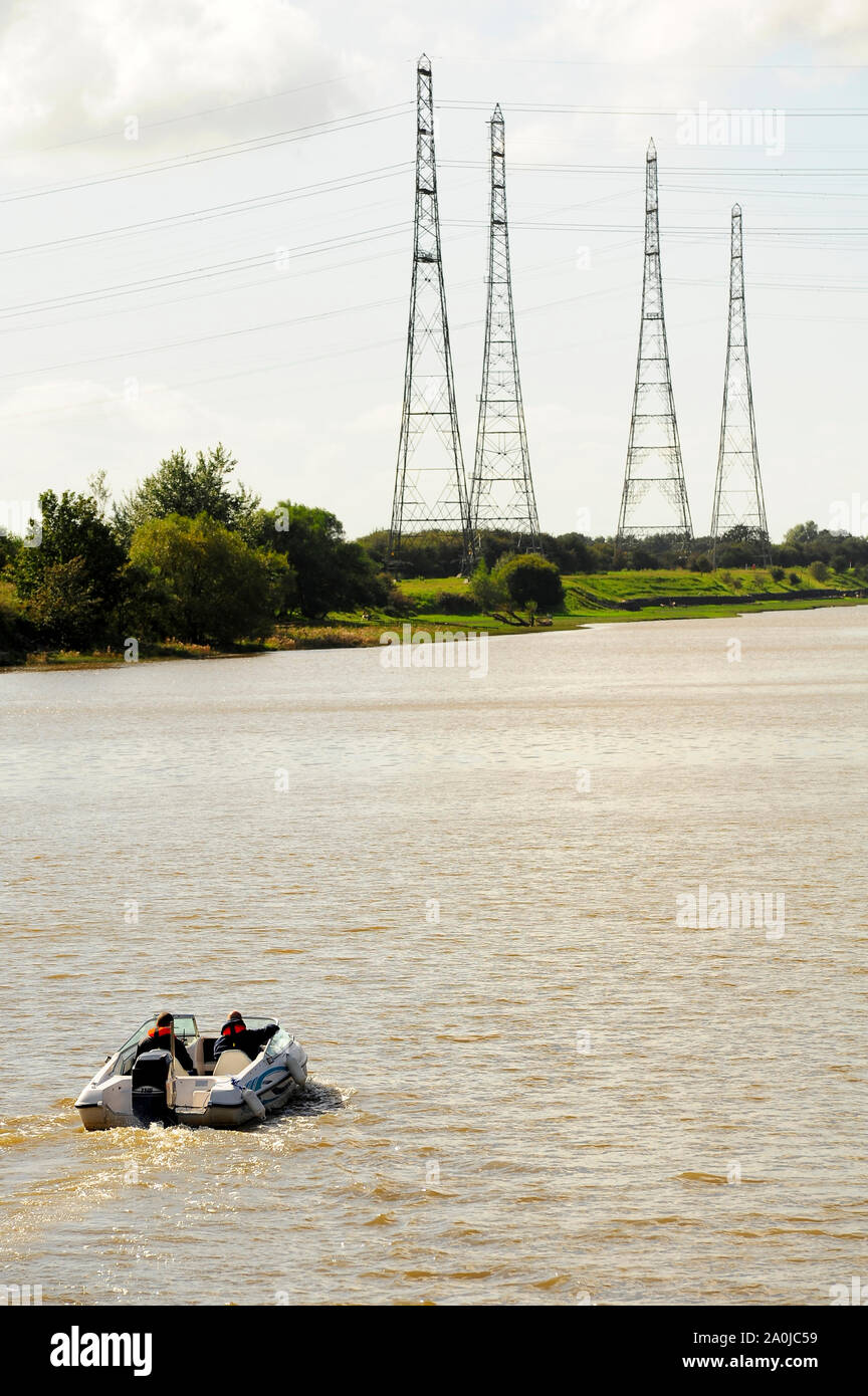 Speed boat heads up the River Ribble from Preston Marina towards the ...
