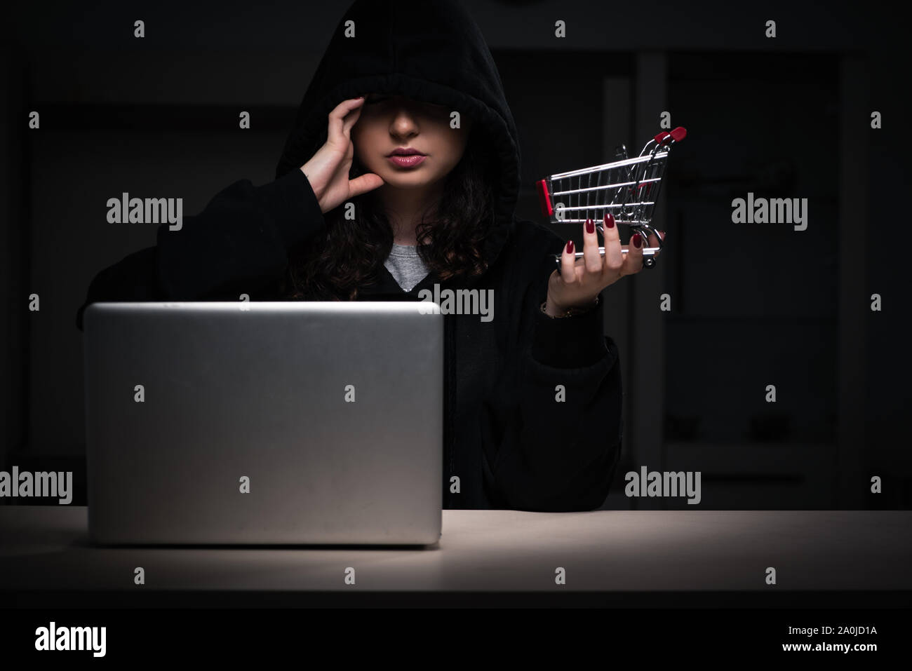 The female hacker hacking security firewall late in office Stock Photo ...