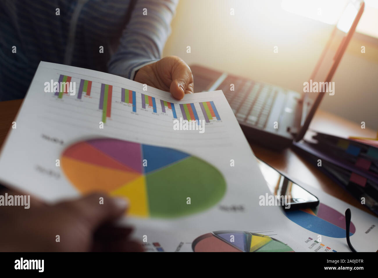 Colleagues submitted trade data chart document to each other. Business ...