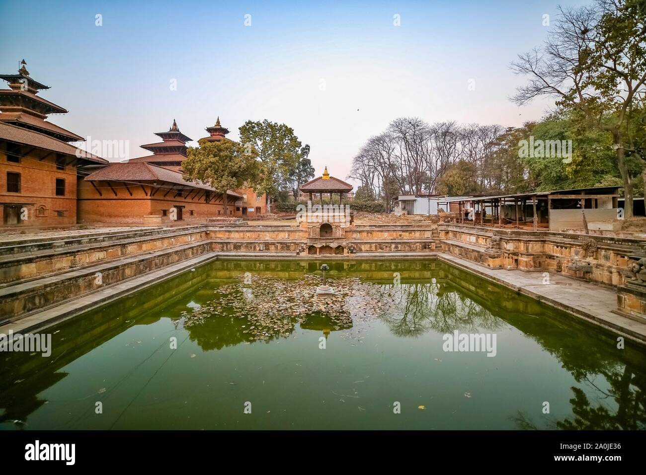 Ancient pond with ancient temples in the background Stock Photo - Alamy