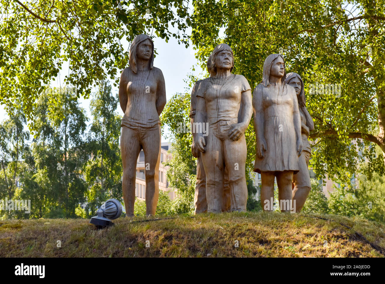 Wooden statues Berlin Stock Photo - Alamy