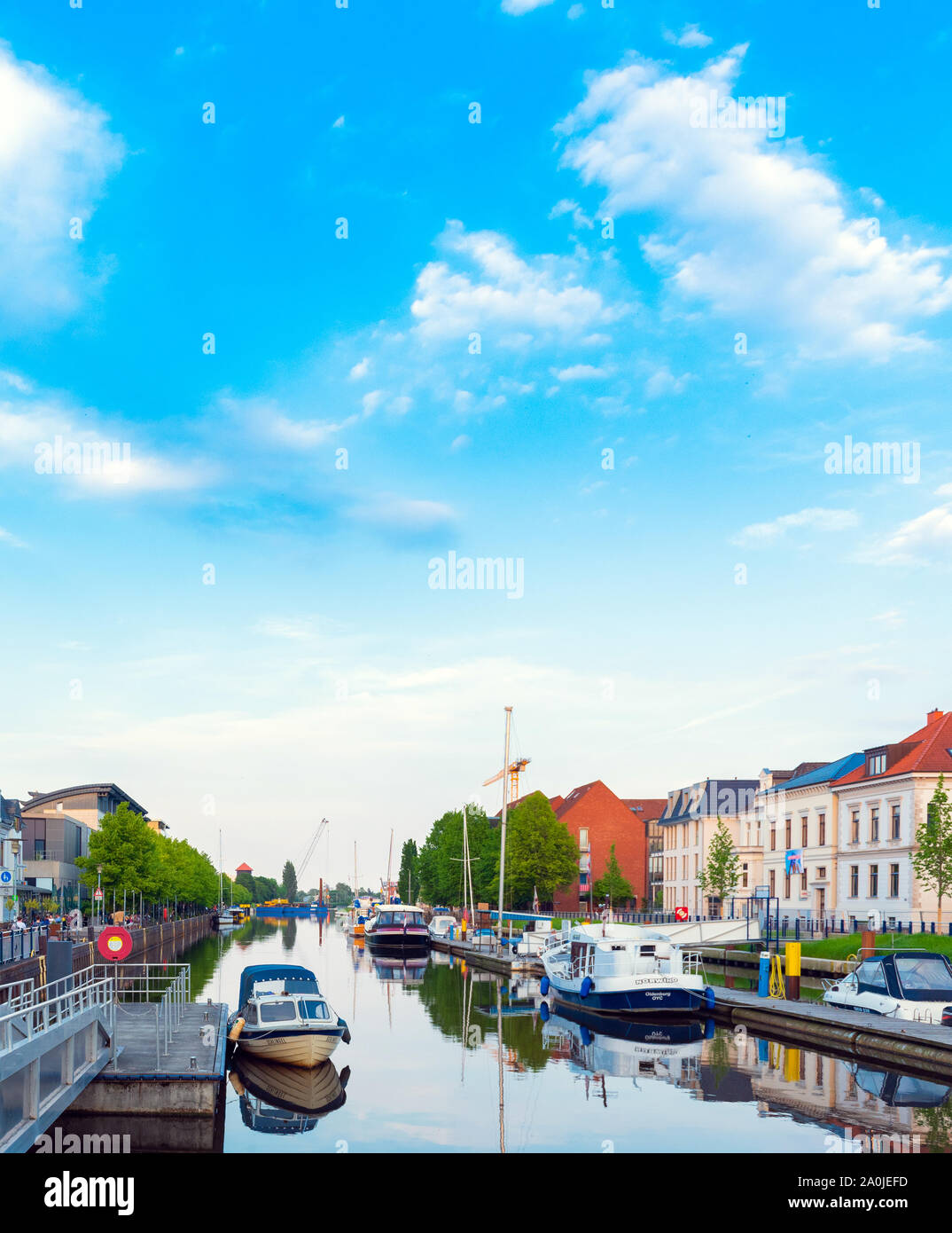 OLDENBURG, GERMANY - MAY 24, 2019: Boats drop anchor in a haven Stock ...