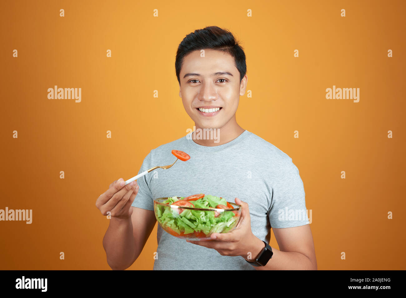 Asian man eating hi-res stock photography and images - Alamy