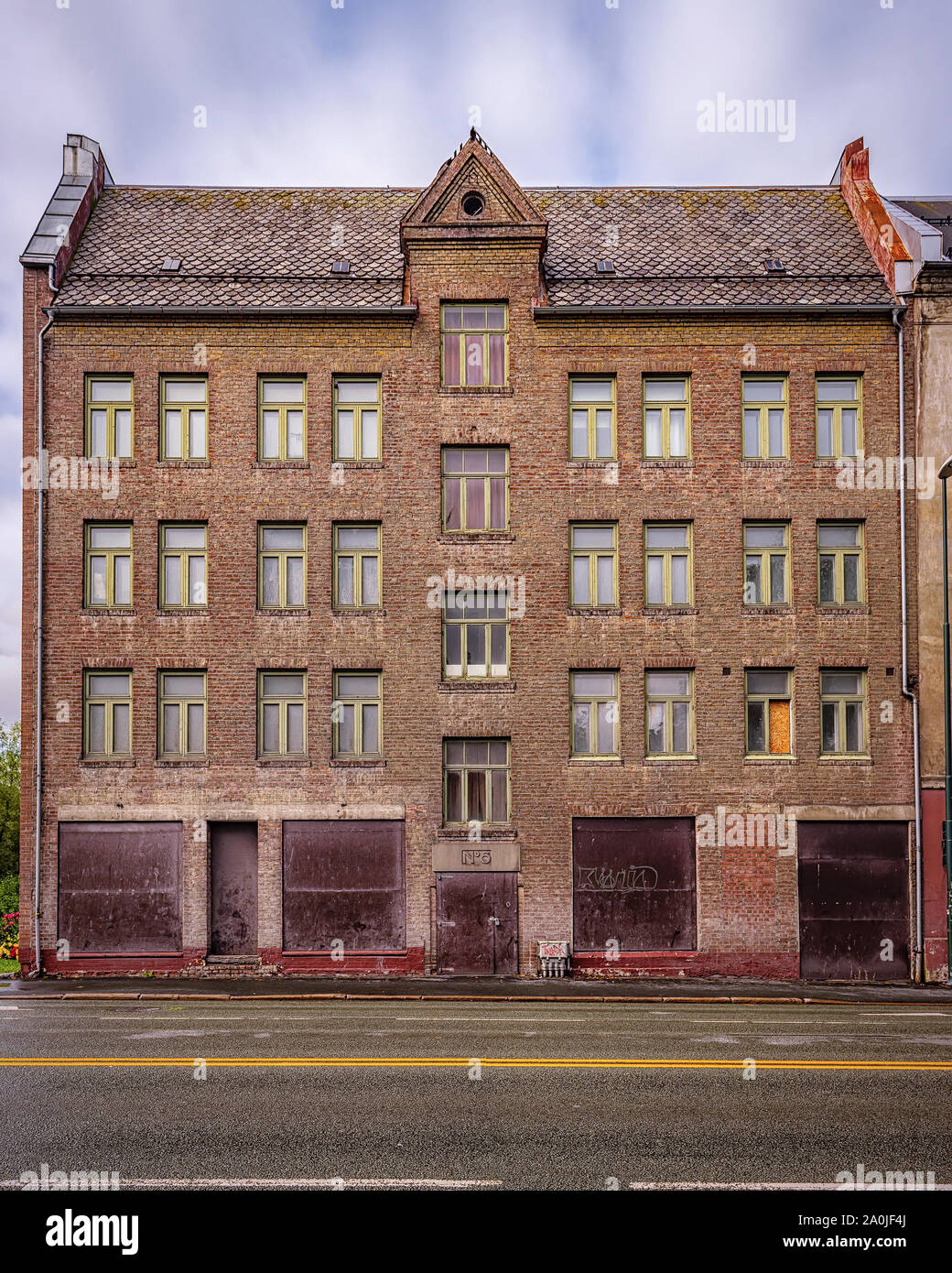 TRONDHEIM, NORWAY - SEPTEMBER 07, 2019: The front facade of a derelict ...