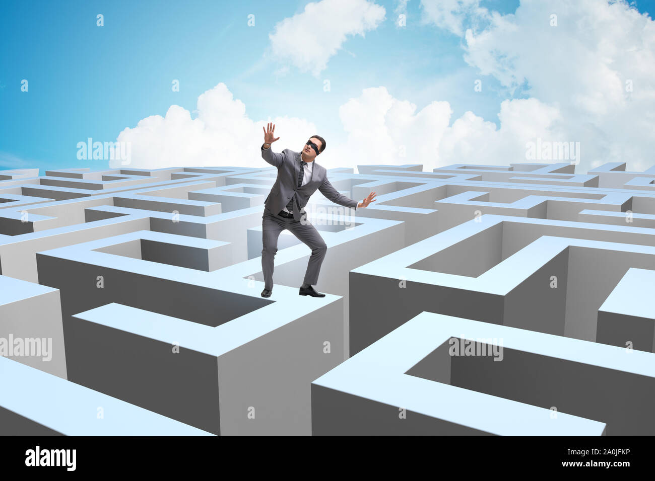 The businessman trying to escape from maze Stock Photo - Alamy