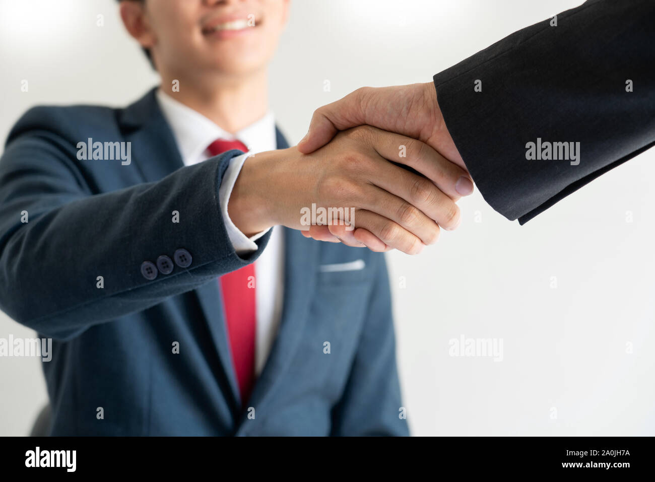 success dealing, two people shake hand as cooperate and teamwork to ...