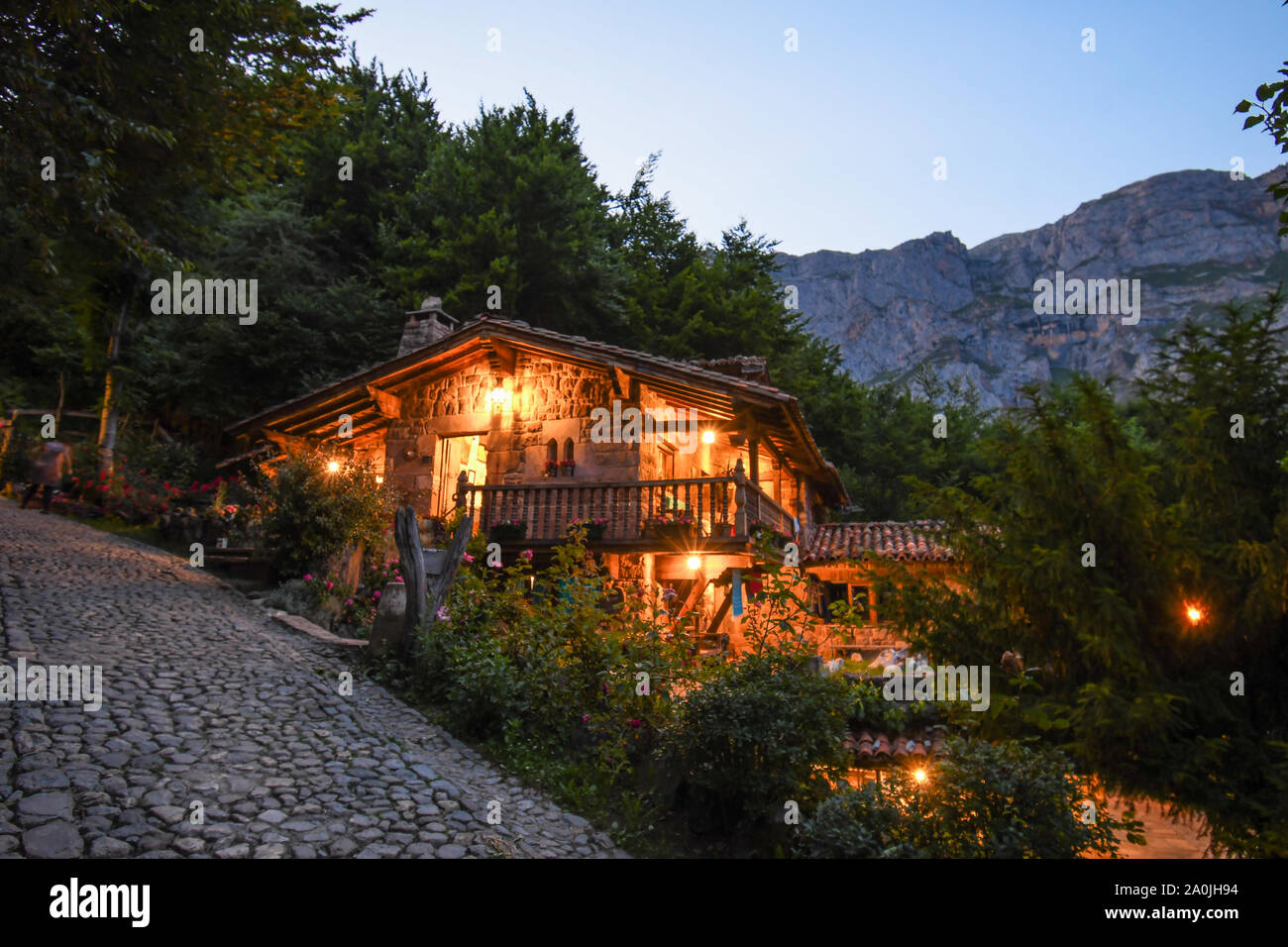 House with lights in forest hi-res stock photography and images - Alamy