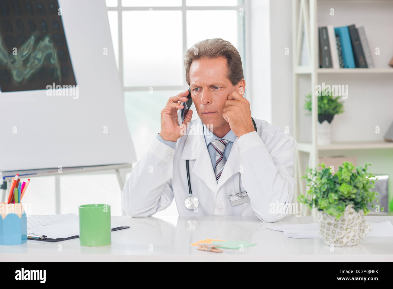 Phone call male doctor hi-res stock photography and images - Alamy
