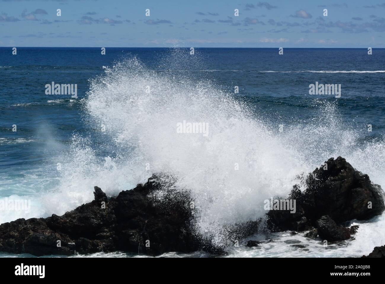 Easter Island typical wave in calm sea Stock Photo - Alamy