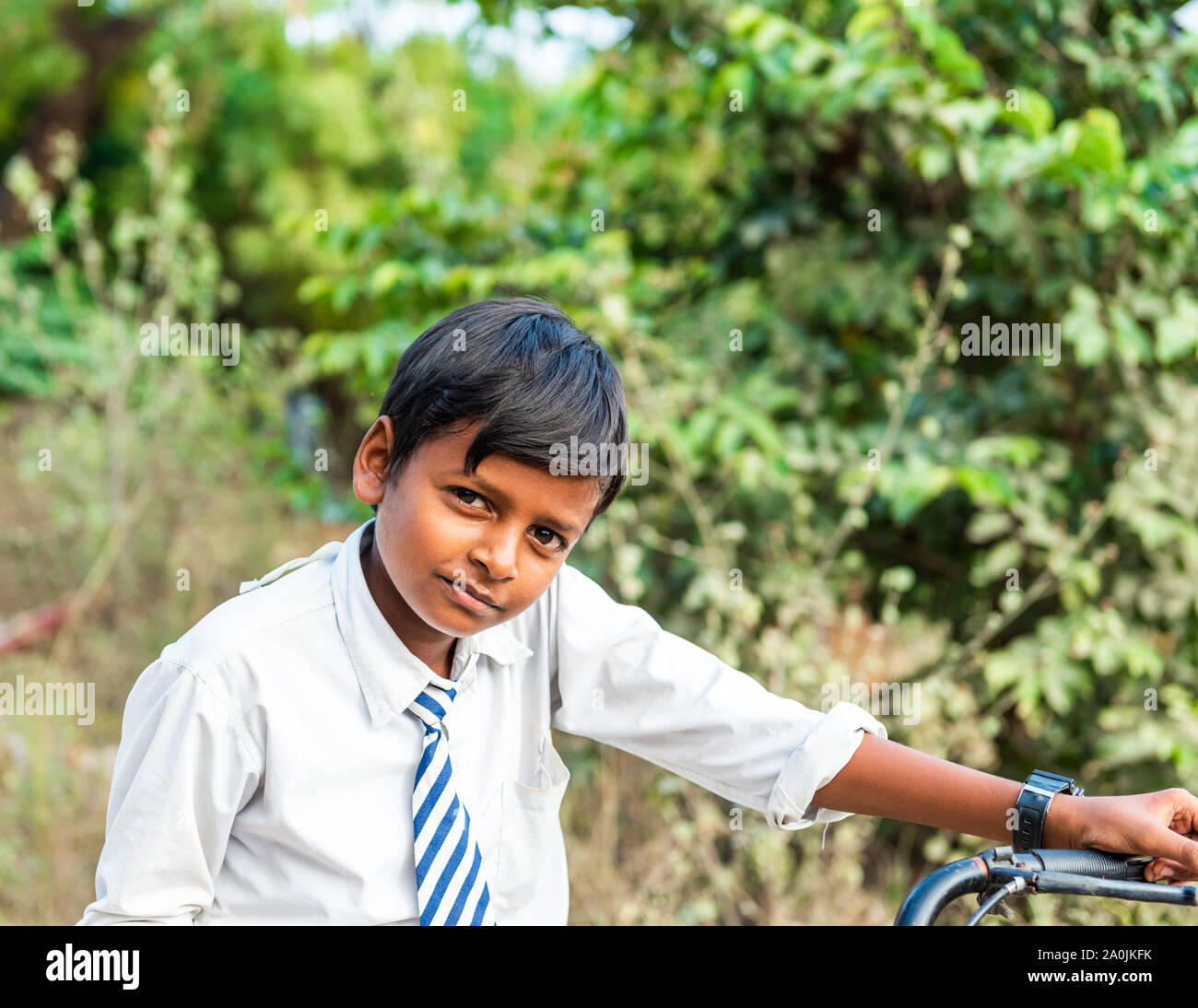 PUTTAPARTHI, INDIA - NOVEMBER 29, 2018: Indian boy in school uniform ...