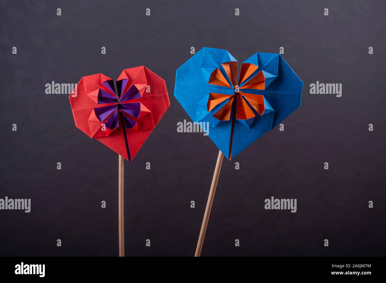 Concept of love handmade papercraft origami crafted colored paper heart ...