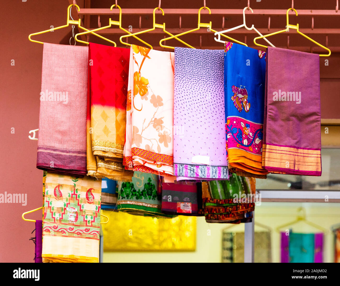 Indian sari in the local market, Puttaparthi, India. With selective ...