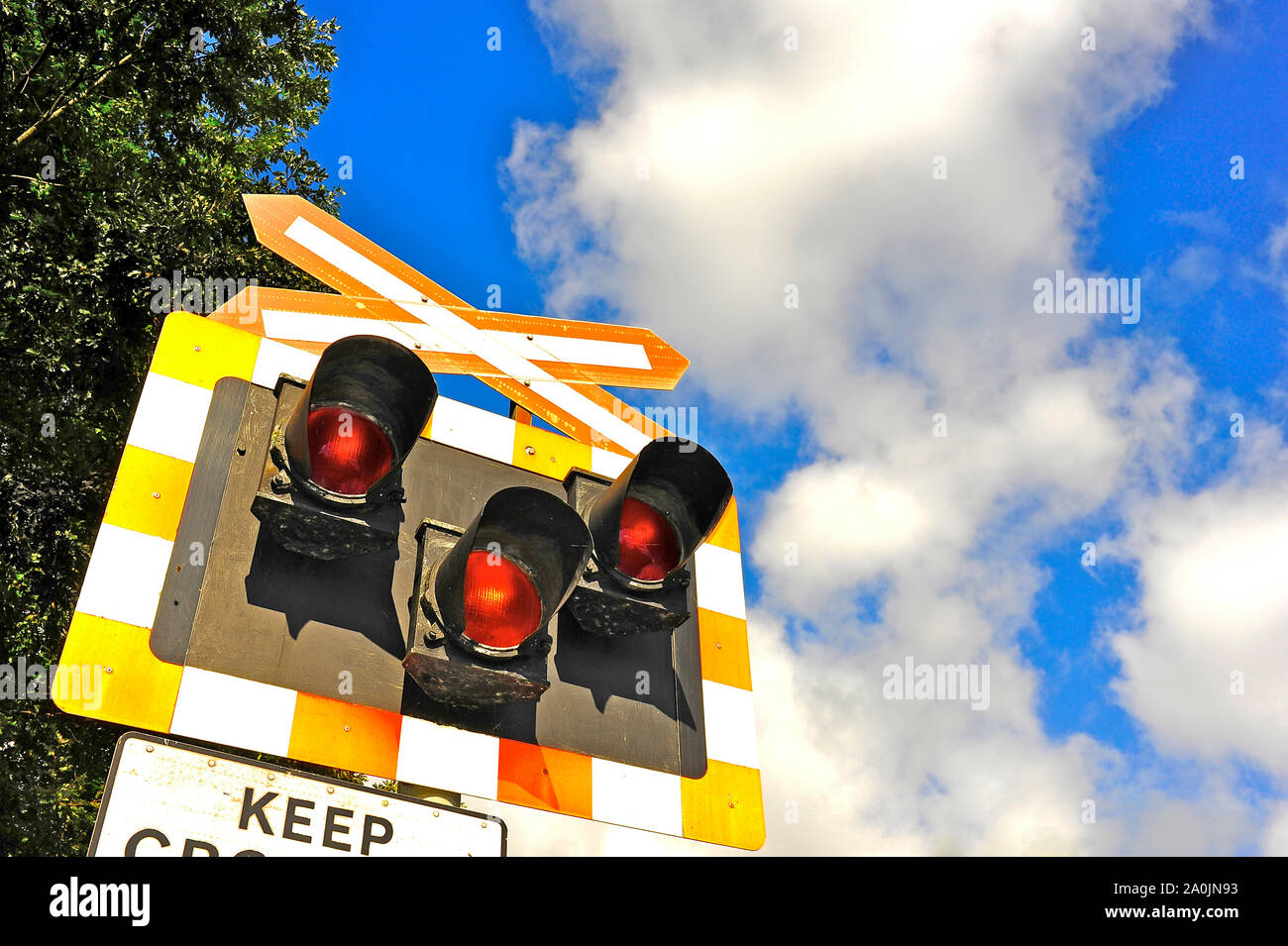 Traffic lights at railway level crossing Stock Photo - Alamy