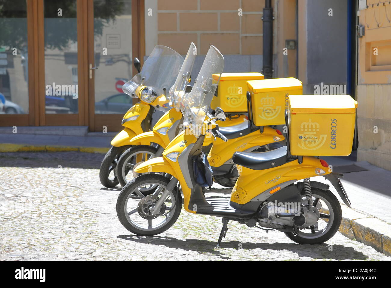 Spanish post office delivery motorbike parked in Segovia Spain Stock ...