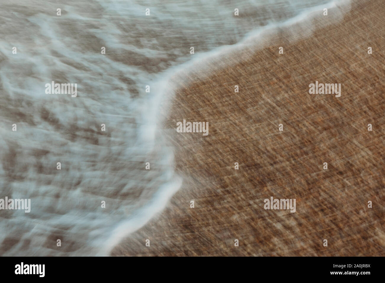 Abstract View of Waves on Beach Stock Photo - Alamy