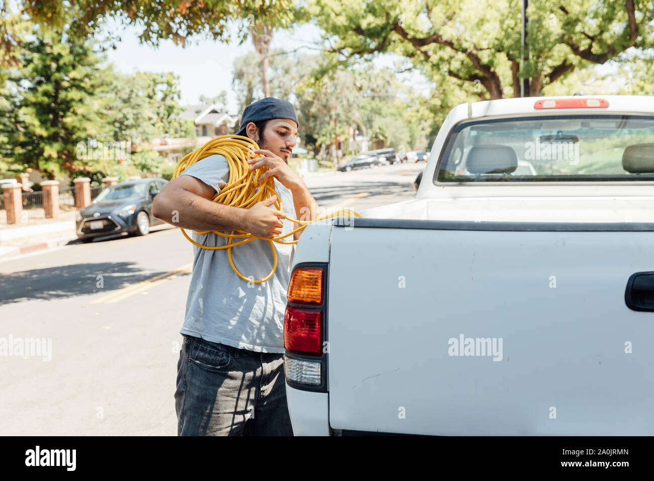 Man preparing to work Stock Photo - Alamy