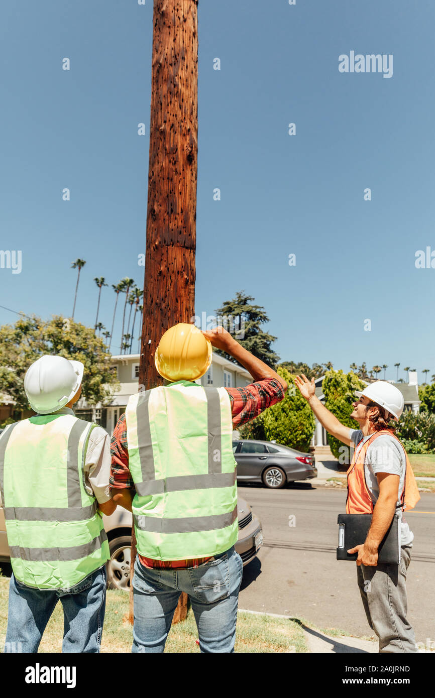 Man signals to others Stock Photo - Alamy