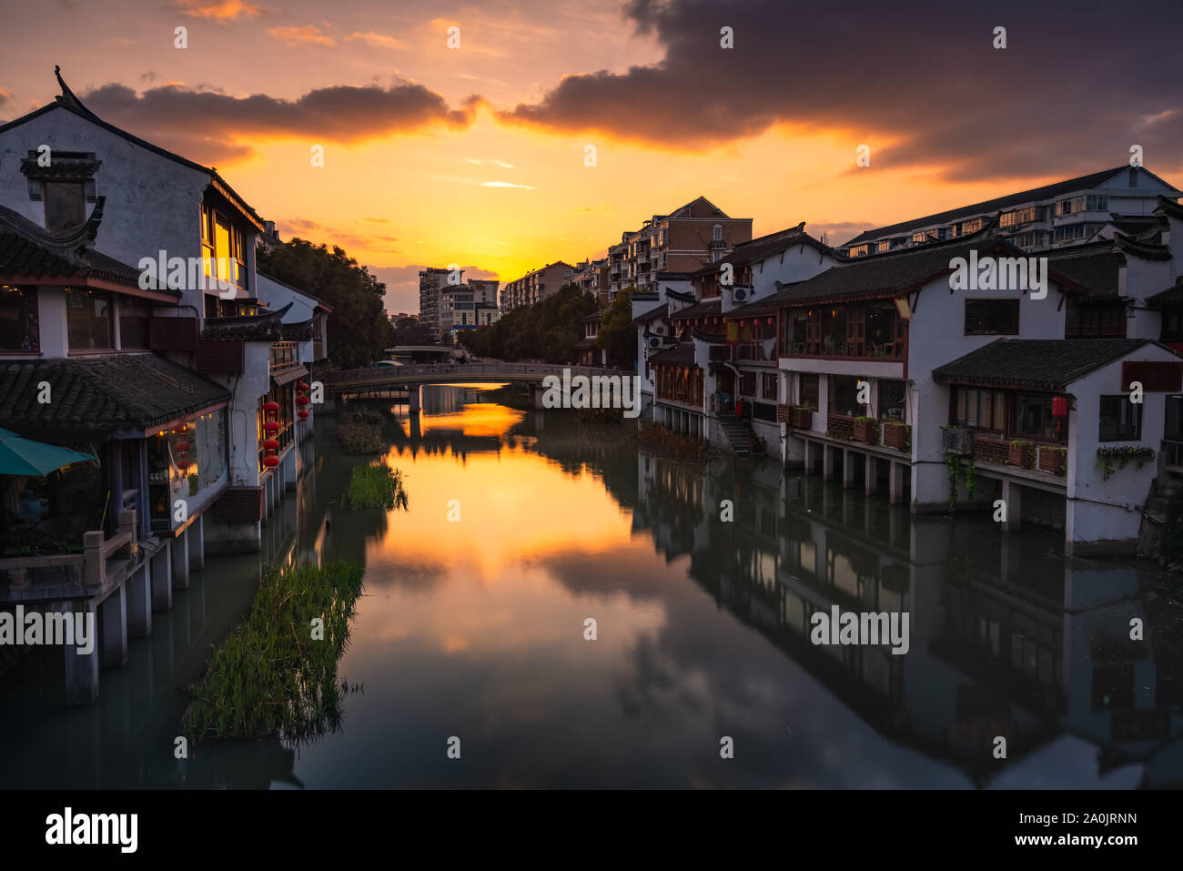 The sun sets over Qibao Ancient Town, a historical water village on the ...