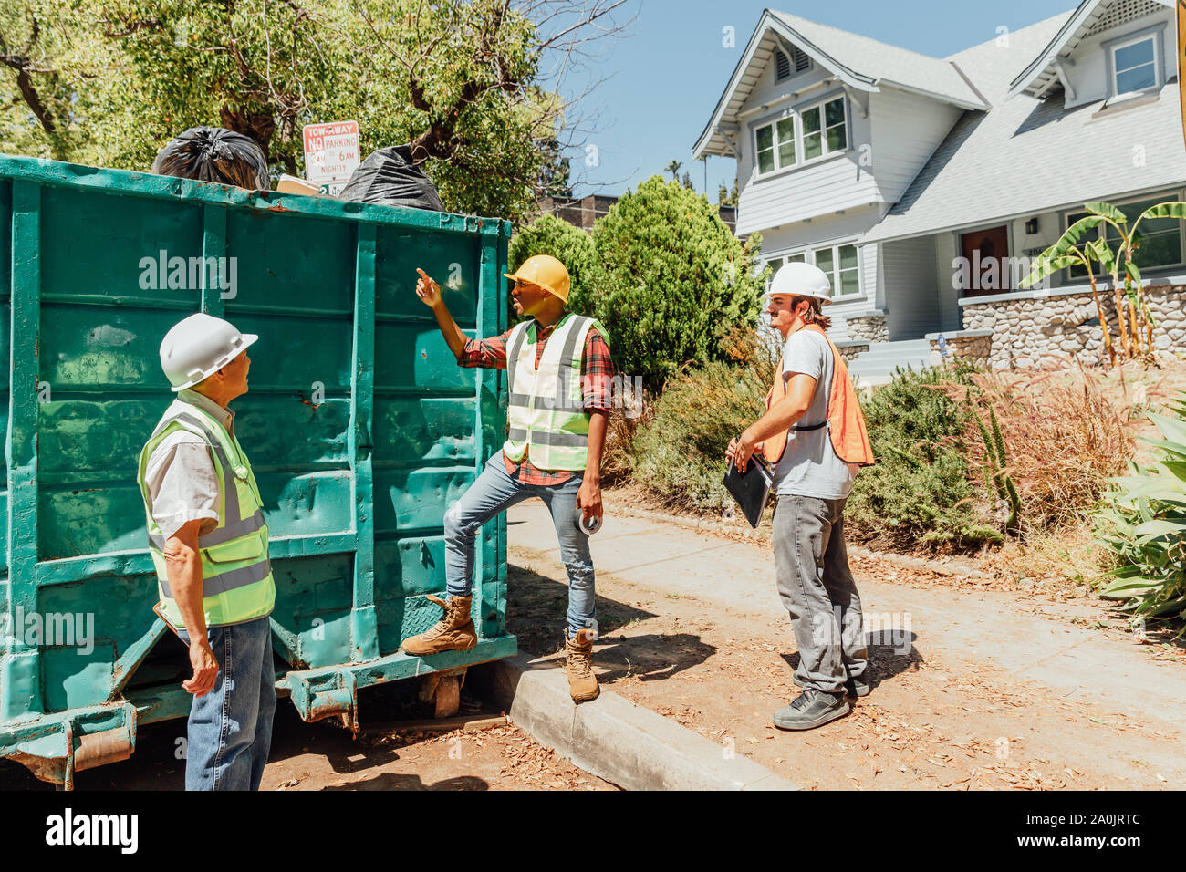Men working outside Stock Photo - Alamy