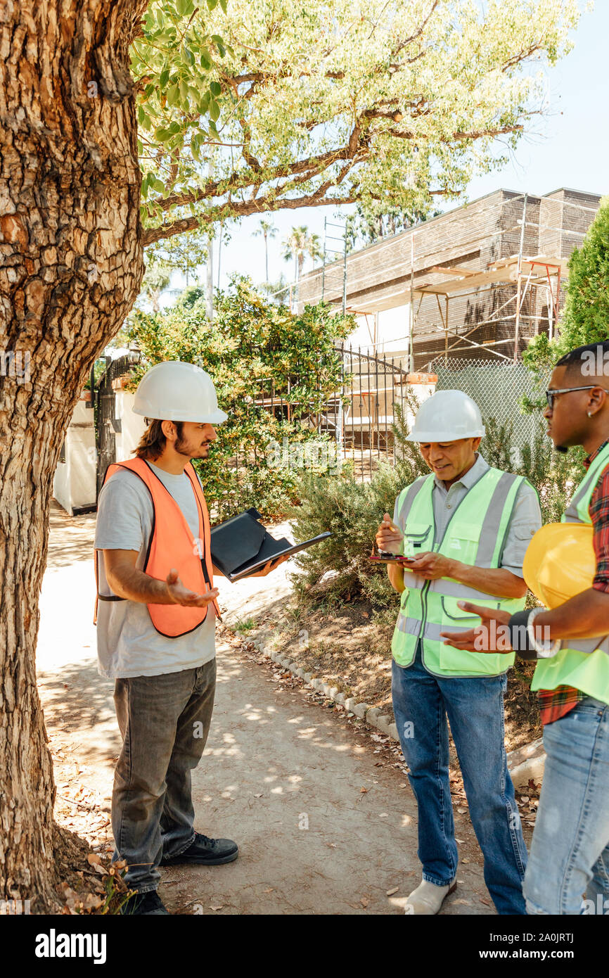 Working on a job site Stock Photo - Alamy