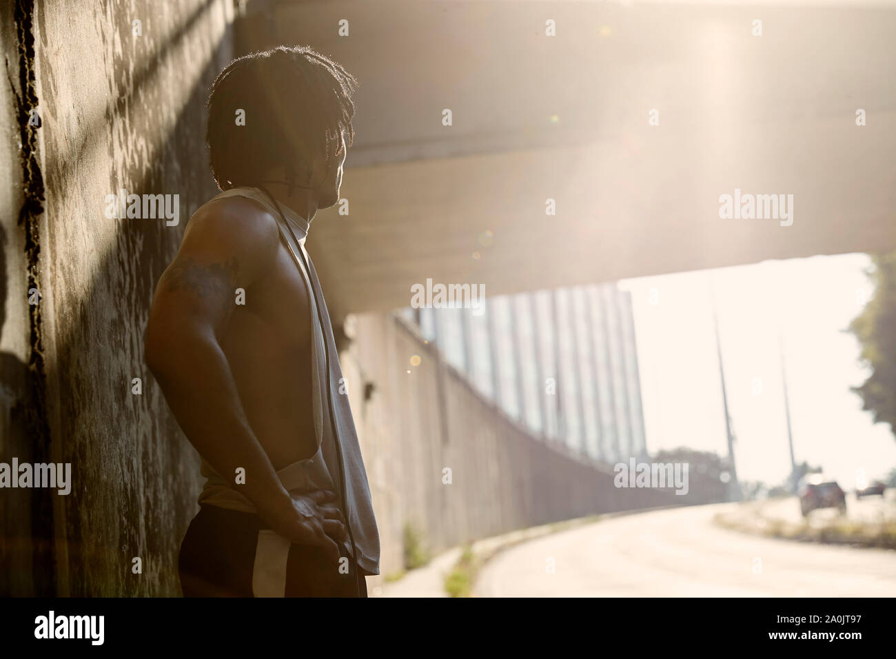 African-American man looking up street Stock Photo - Alamy