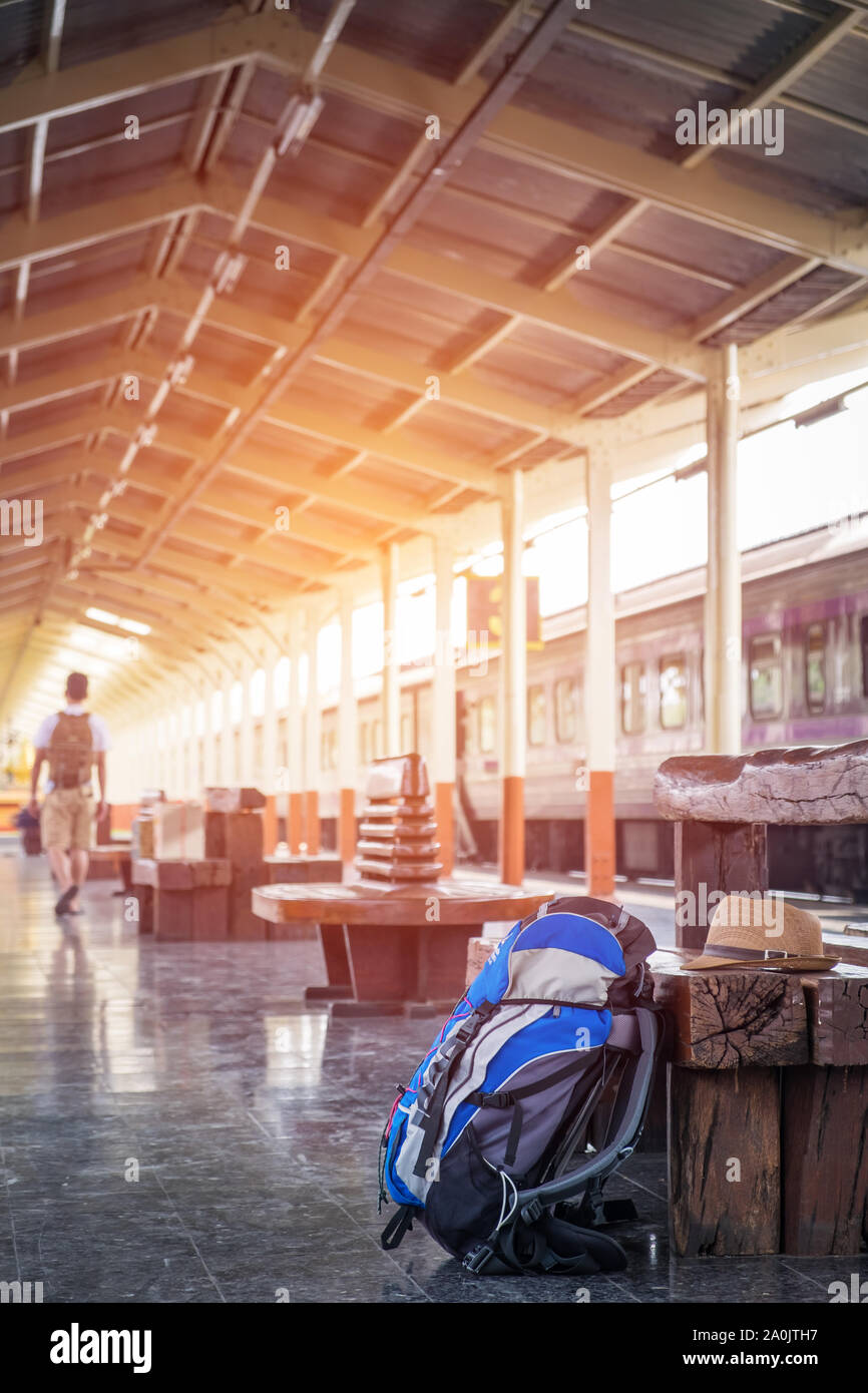 Traveler's bag at a train station Stock Photo - Alamy