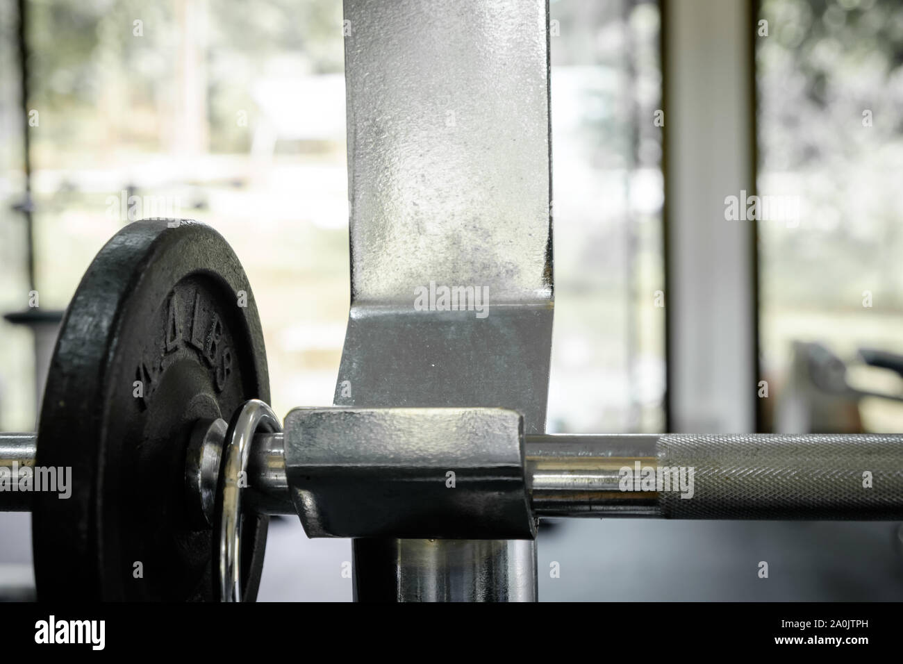 exercise weights - iron dumbbell with extra plates Stock Photo - Alamy