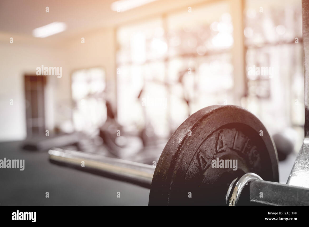 exercise weights - iron dumbbell with extra plates Stock Photo - Alamy