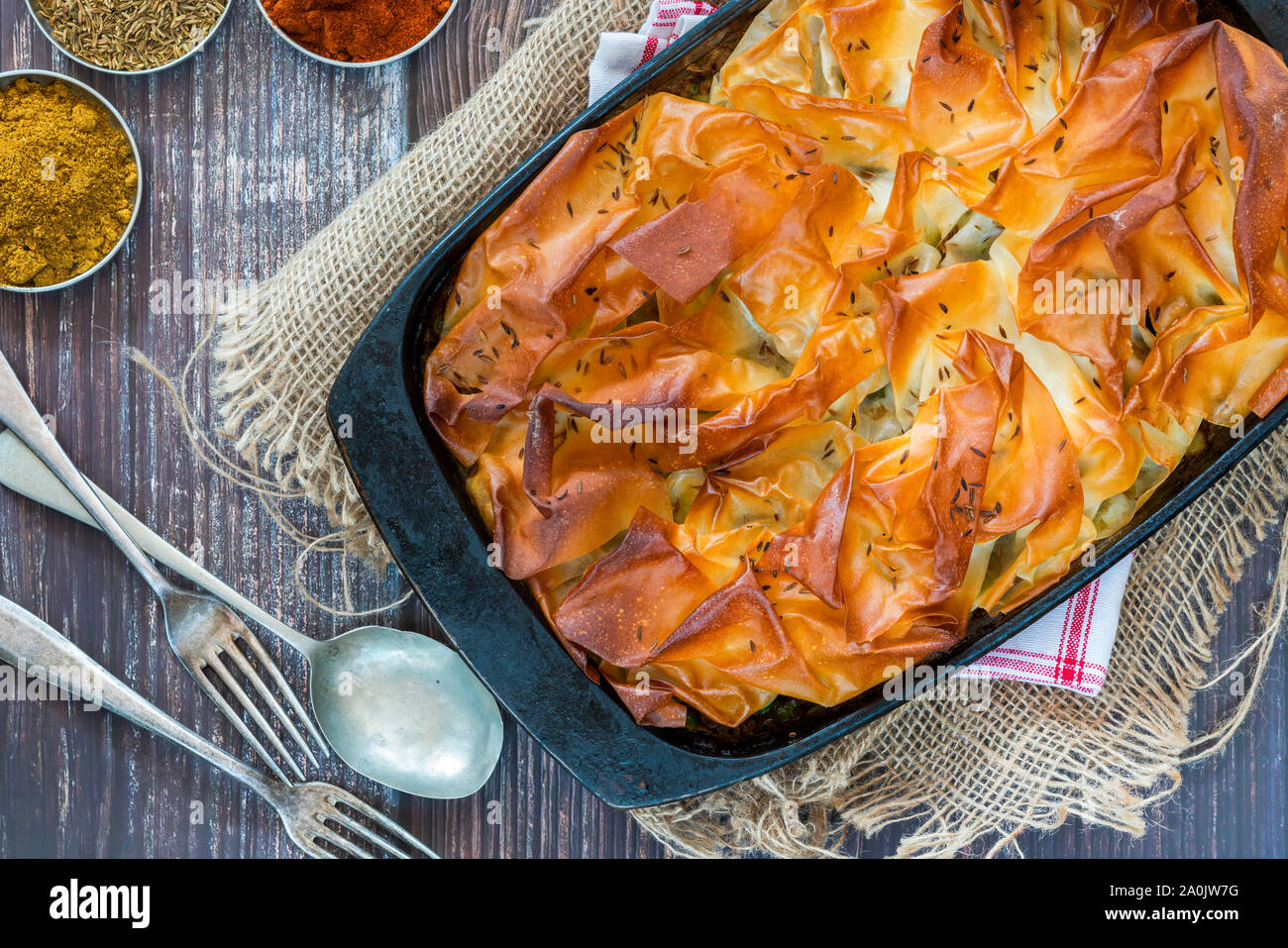 Lamb samosa pie - popular Indian dish with a savoury filling - overhead ...