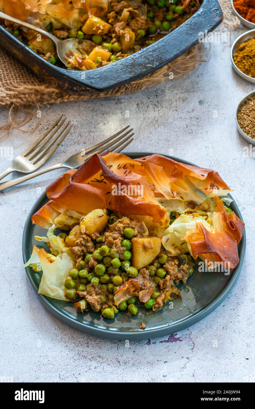 Lamb samosa pie - popular Indian dish with a savoury filling Stock ...