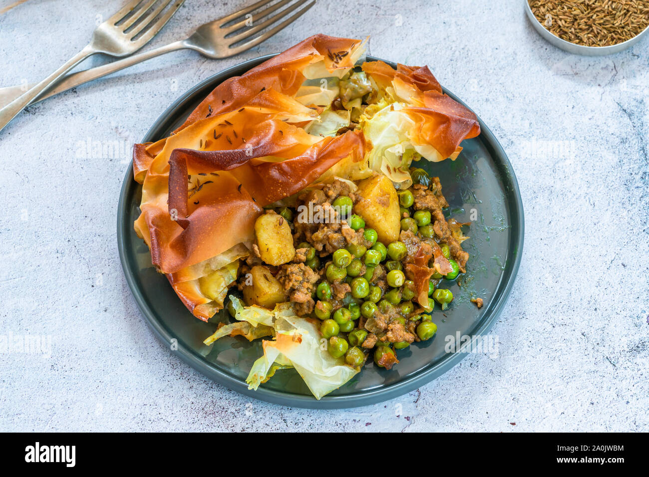 Lamb samosa pie - popular Indian dish with a savoury filling Stock ...