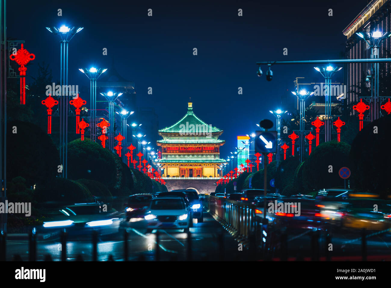 The old Bell Tower of Xian, China lit up at night Stock Photo - Alamy
