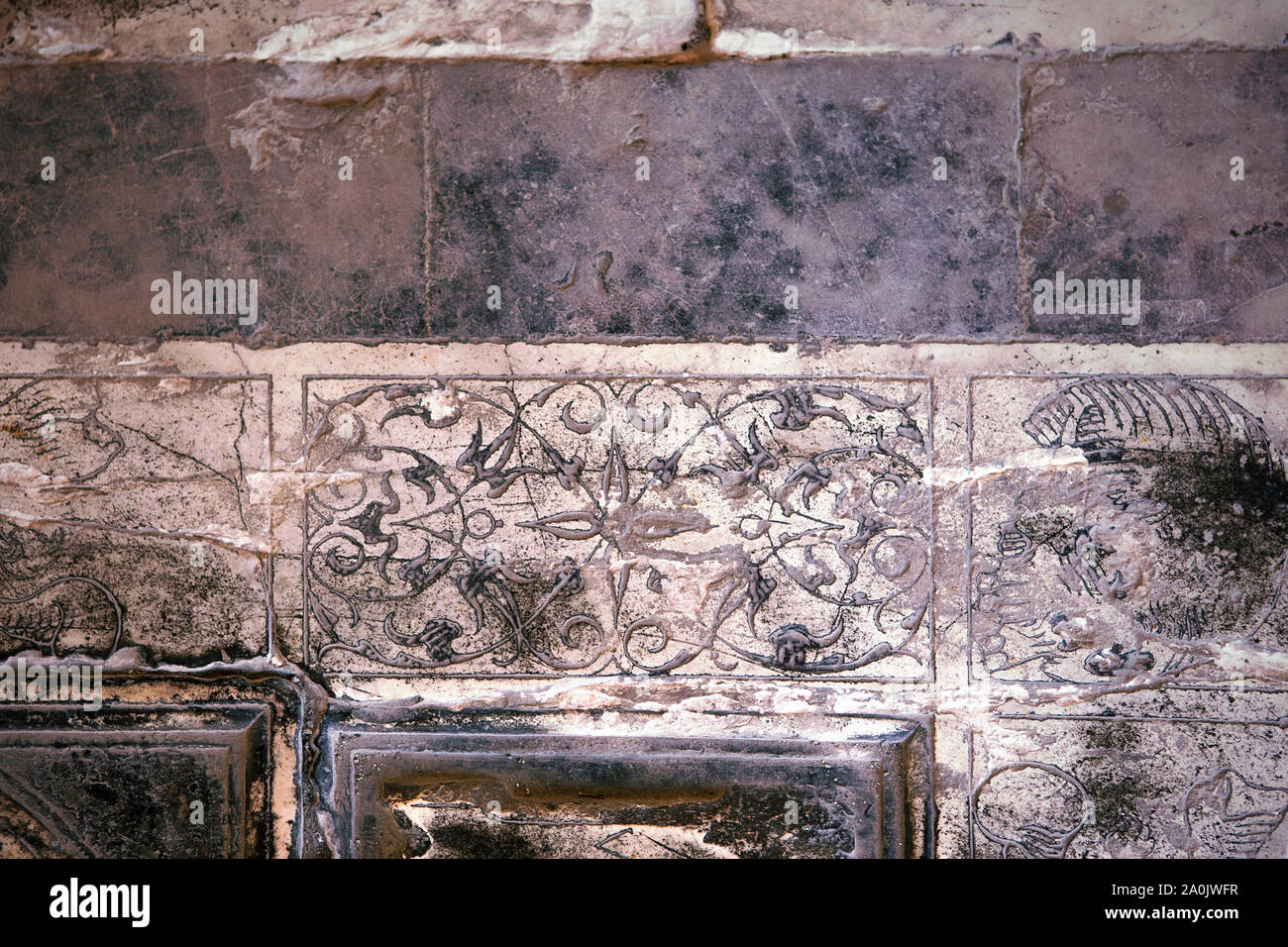Old grunge medieval decorative tiles background. Old dirty marble ...