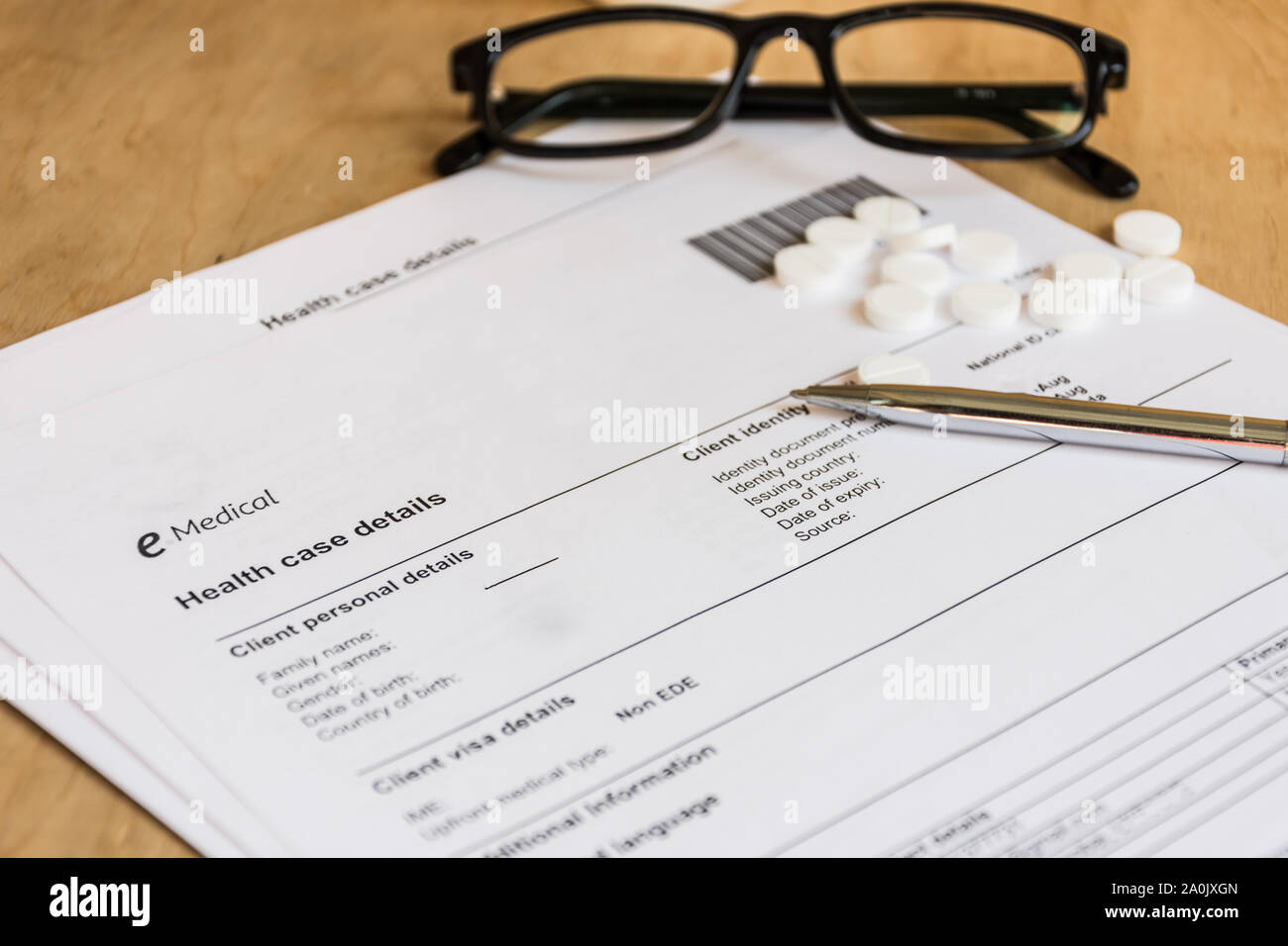 Medical examination paper on wooden background. Health case details of ...