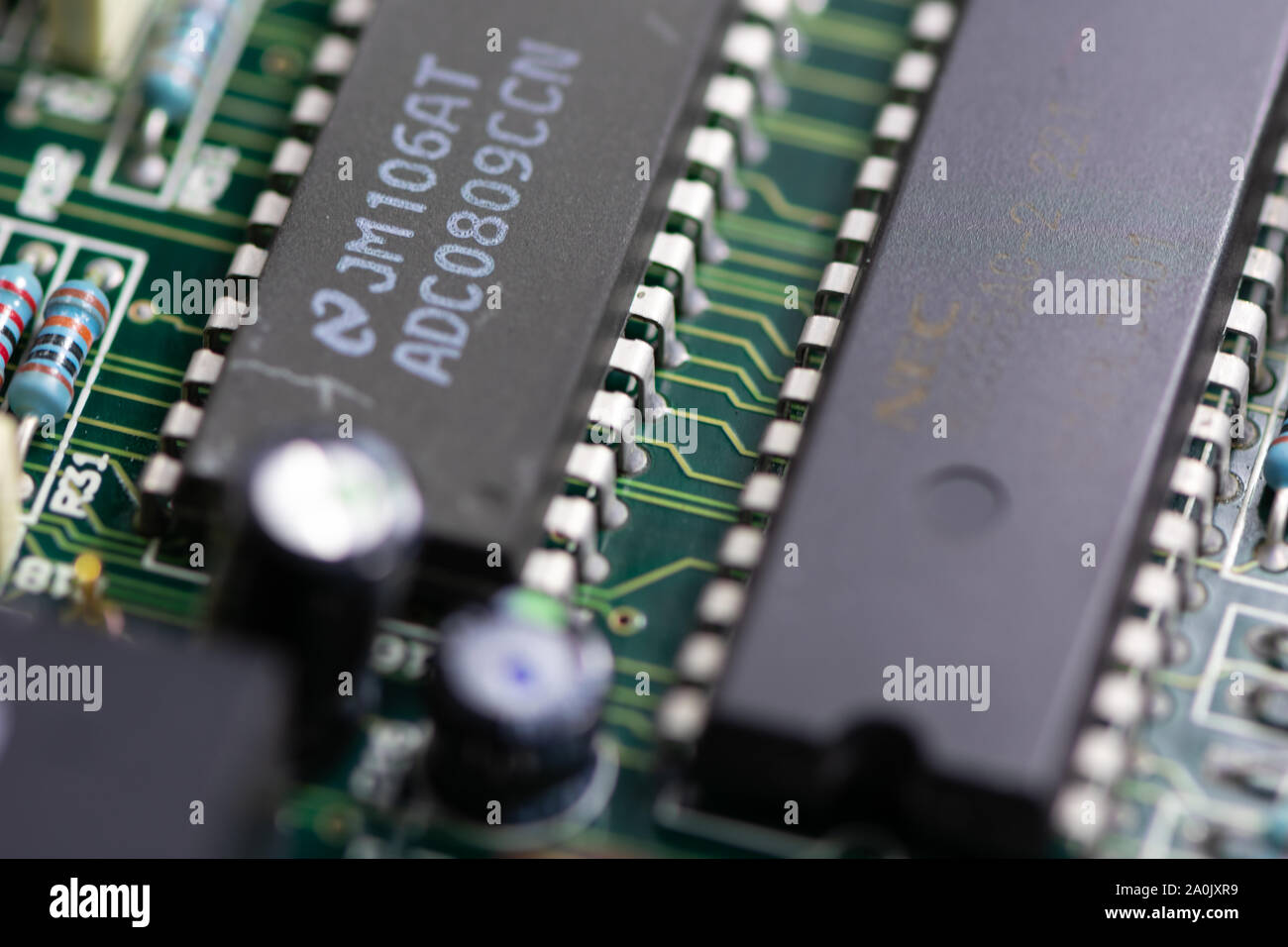 Close up shot of PCB unit with visible resistors, capacitors and micro ...