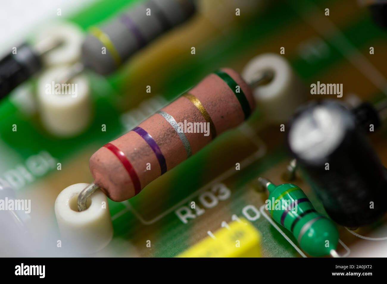 Close up shot of PCB unit with visible resistors, capacitors and micro ...